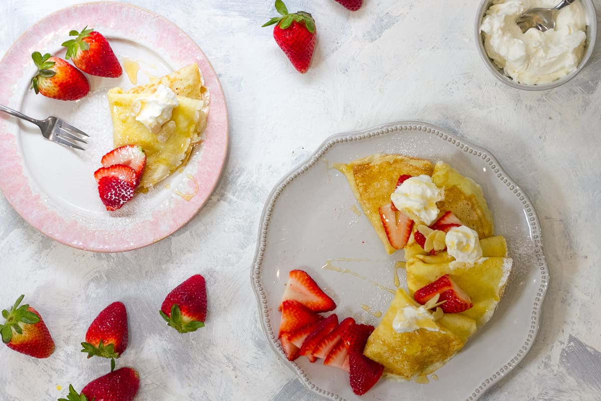 Strawberry Crêpes with Mascarpone Whipped Cream - Champagne Tastes®