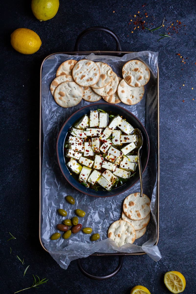 Marinated Feta with Lemon + Herbs - Champagne Tastes®