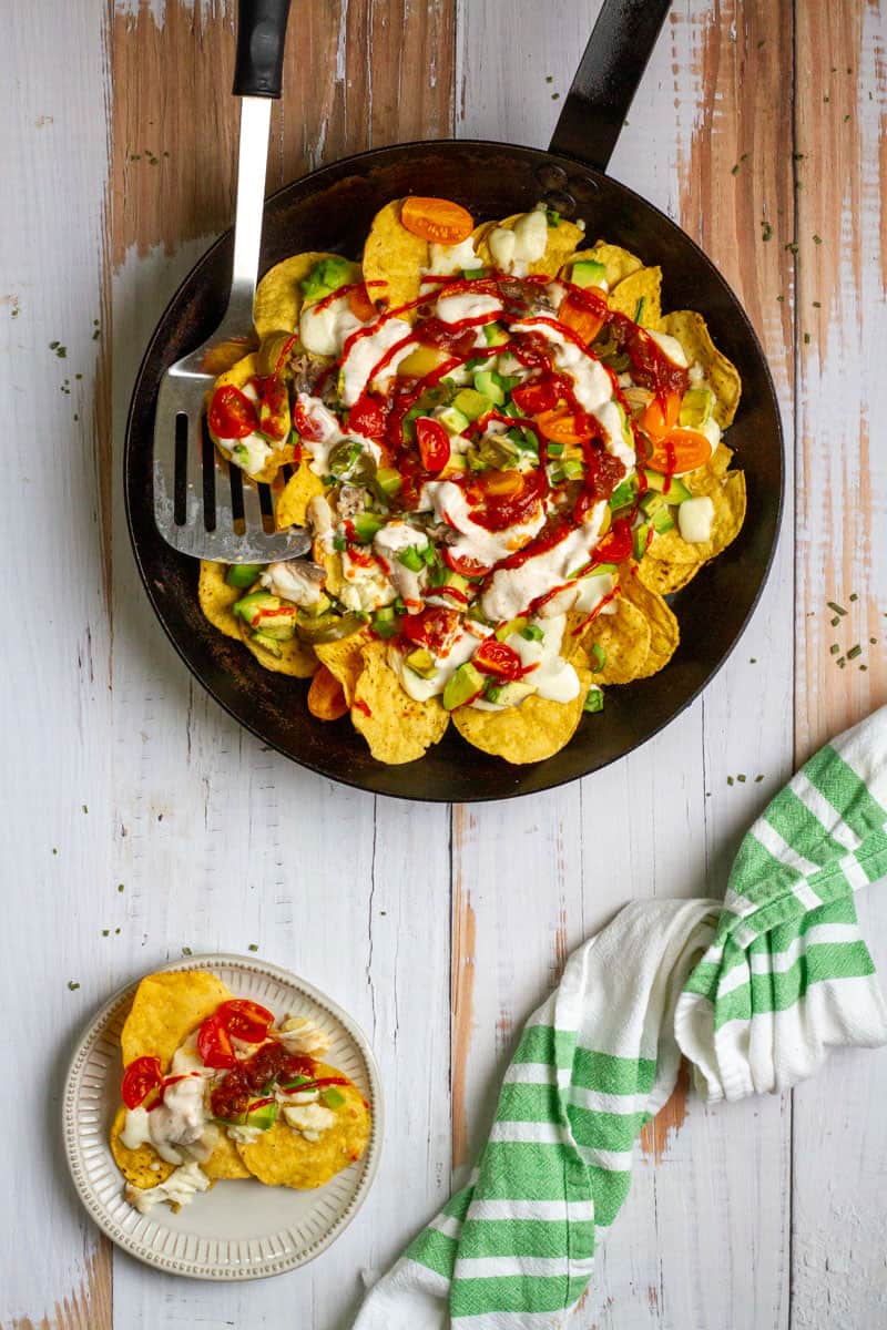 Fish Nachos with White Fish + Garlic Sauce - Champagne Tastes®