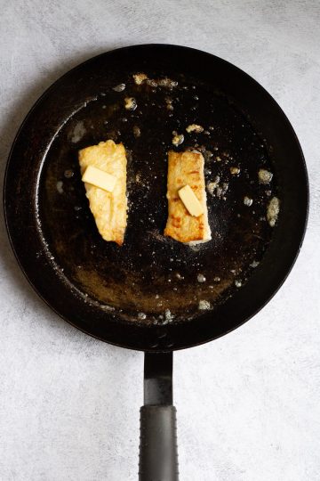 Pan-Seared Haddock with Lemon Caper Sauce - Champagne Tastes®