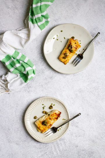Pan-Seared Haddock with Lemon Caper Sauce - Champagne Tastes®