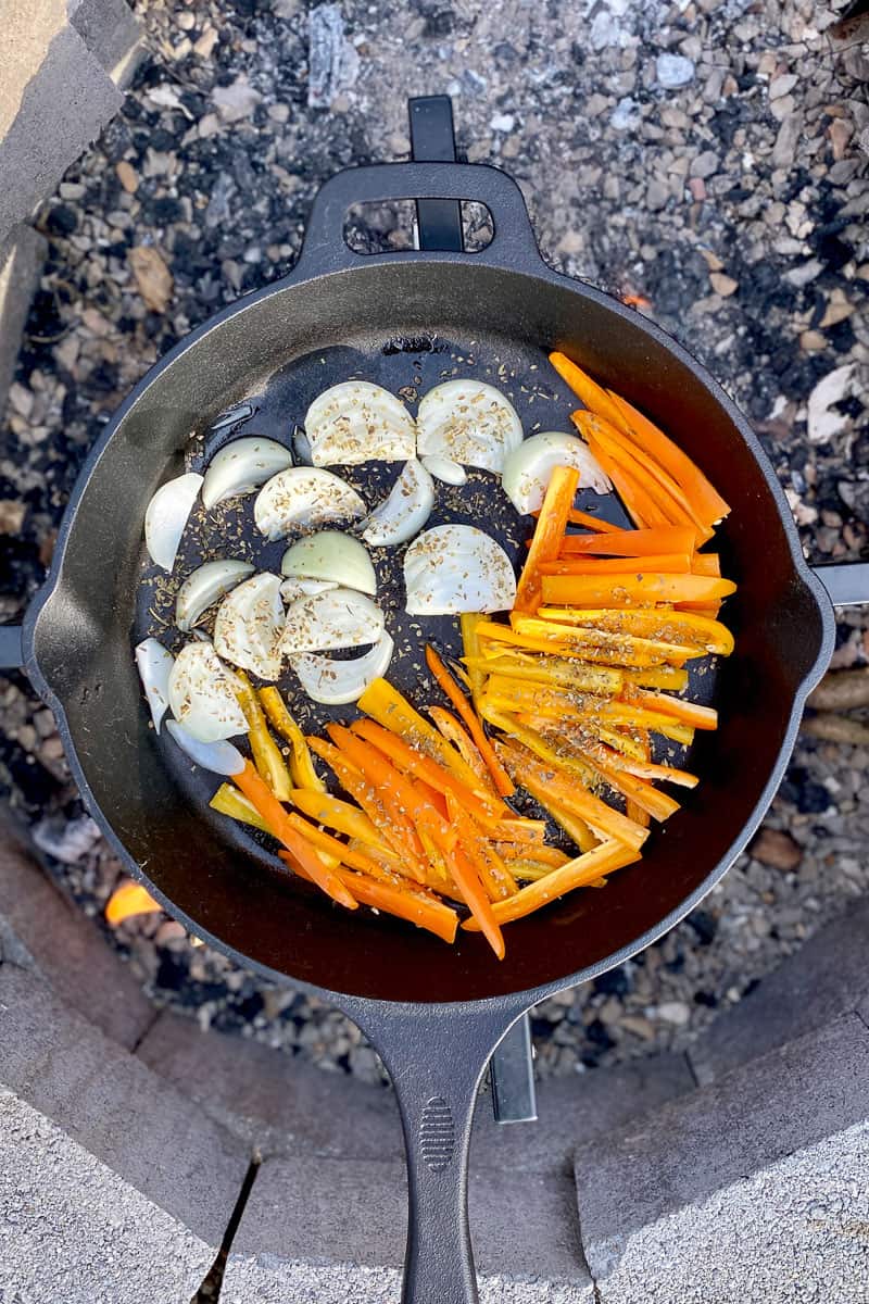 Campfire Brats with Peppers and Onions - Champagne Tastes®