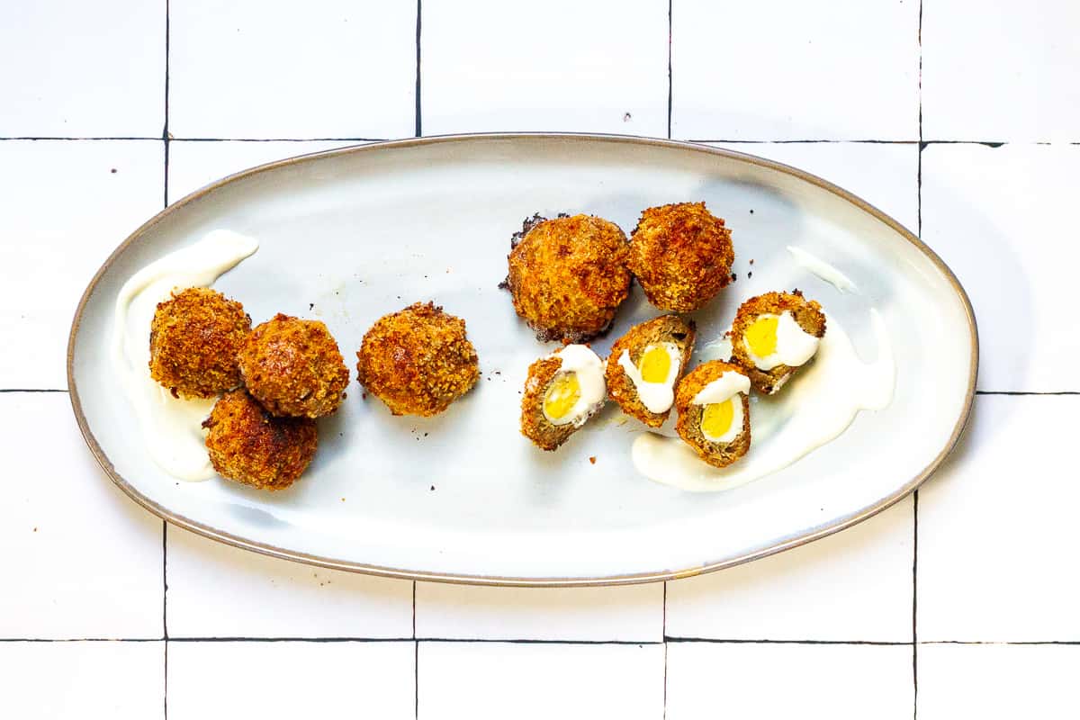Scotch Quail Eggs - Champagne Tastes®